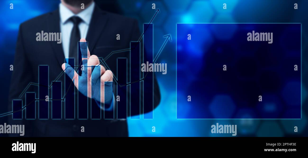 Business Man Presenting New Futuristic Growth Graphs Stock Photo - Alamy