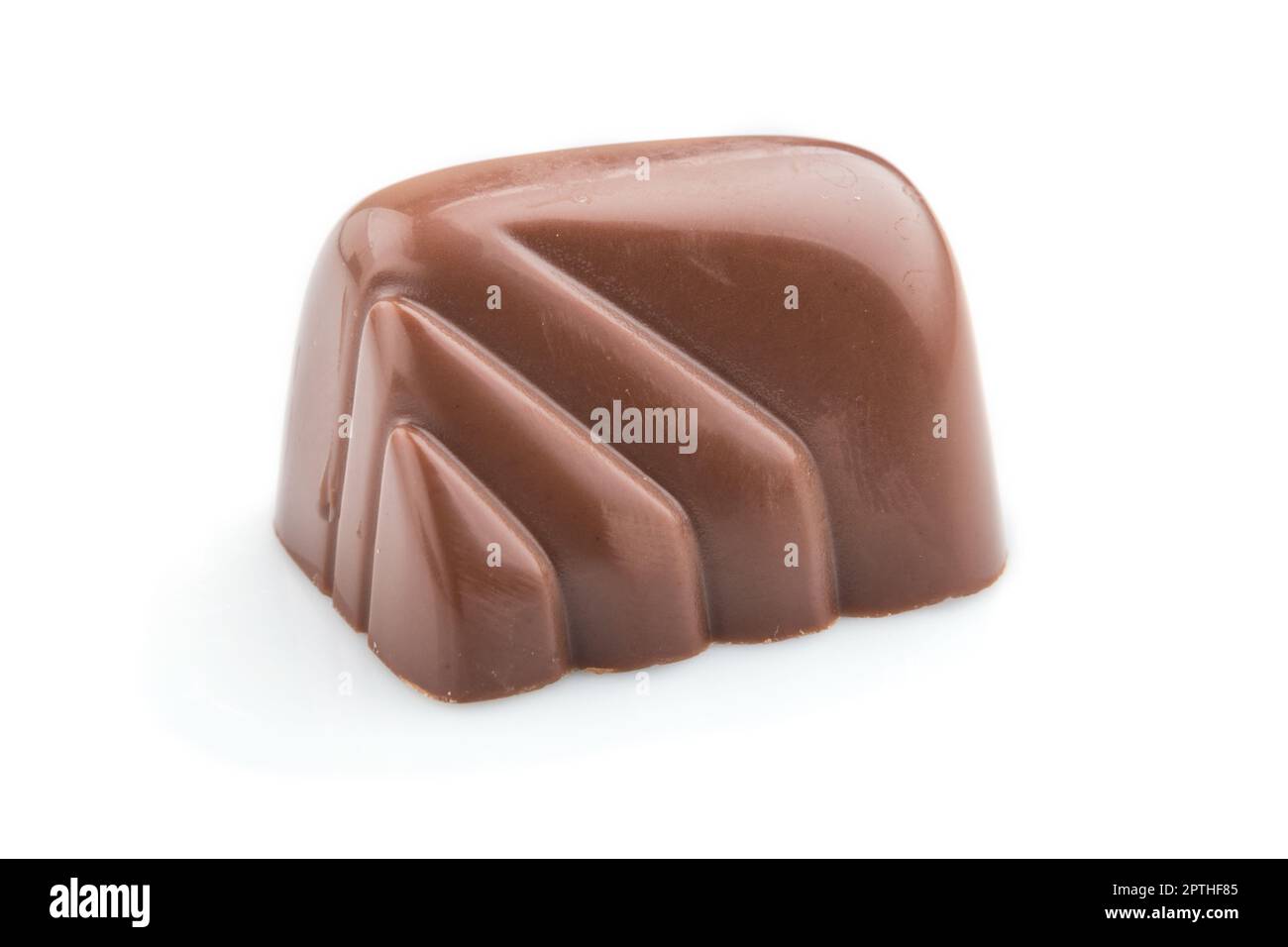 Single chocolate candy isolated on white background. side view, close ...