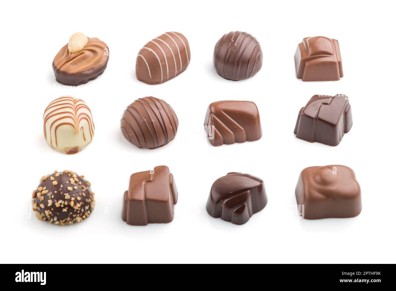 Different chocolate candies isolated on white background. side view ...