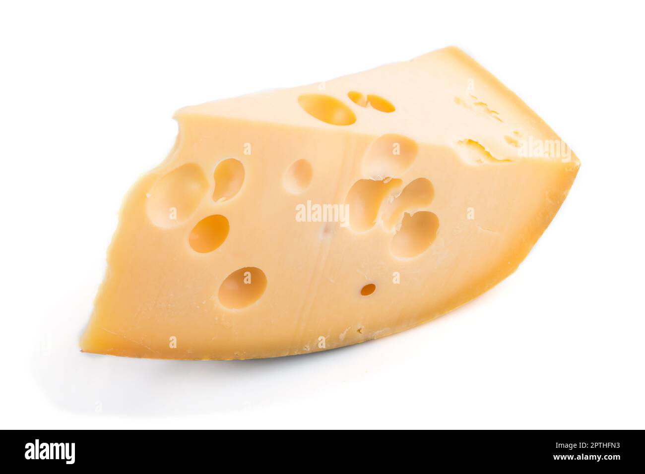 Piece of yellow cheese isolated on white background. Side view, close ...