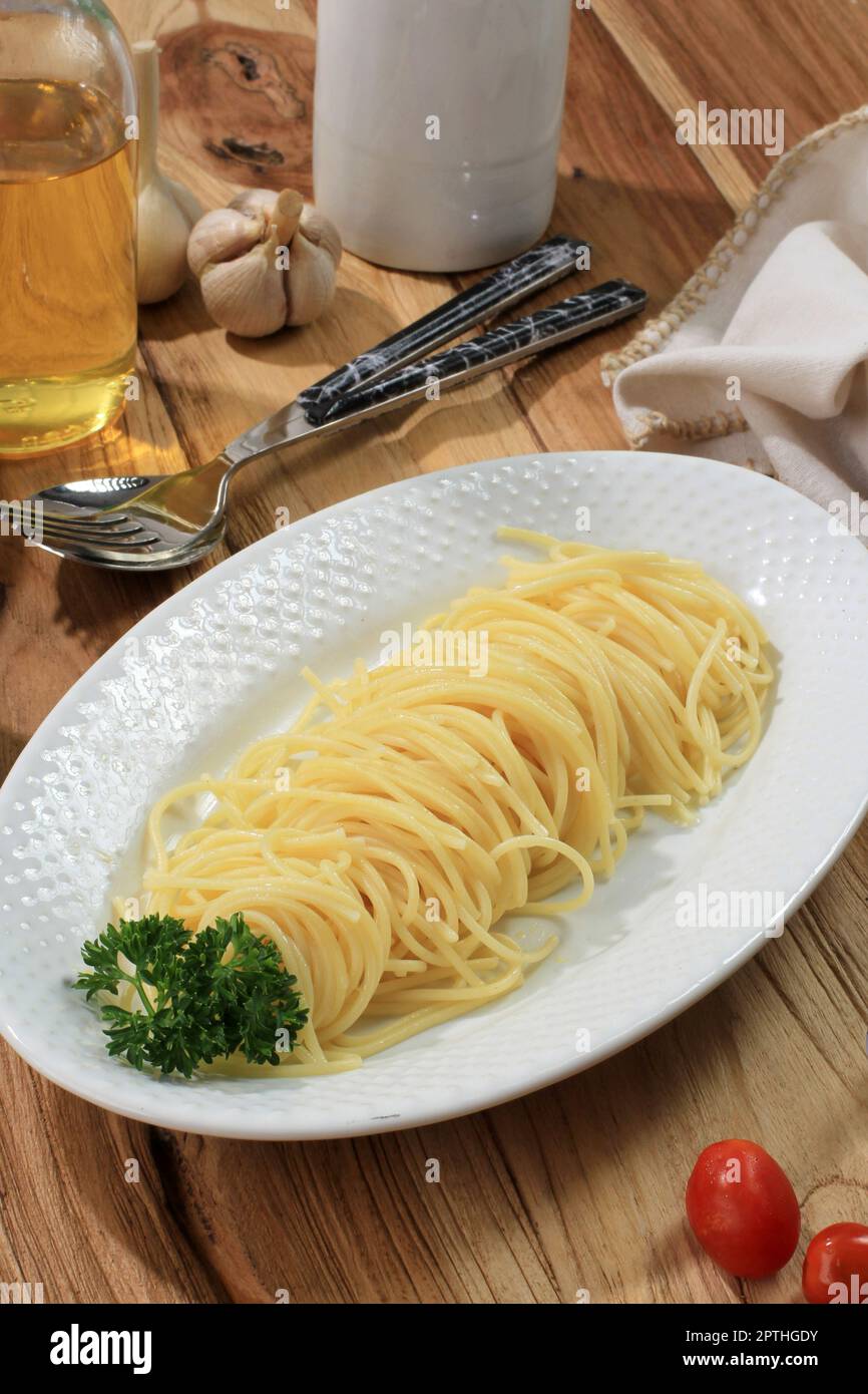 Fresh Boiled Angel Hair Spaghetti on White Plate, Ready to Serve with ...