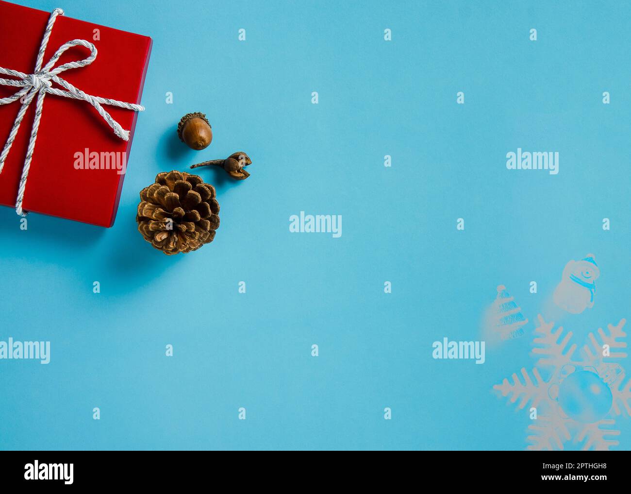 Christmas background of red gifts box with white and silver cord rope ...