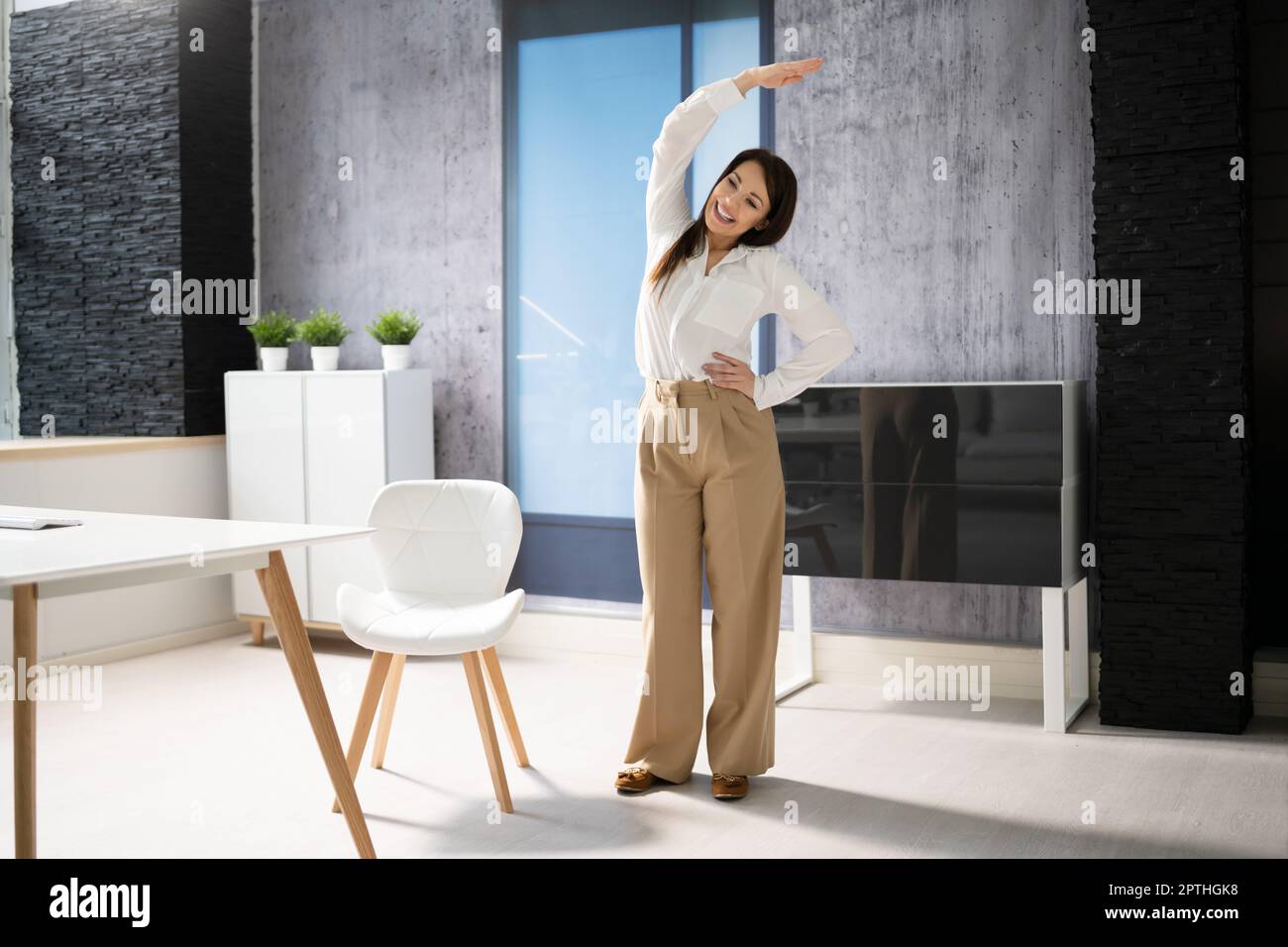 Stretching Office Workout. Desk Stretch Exercise At Workplace Stock ...