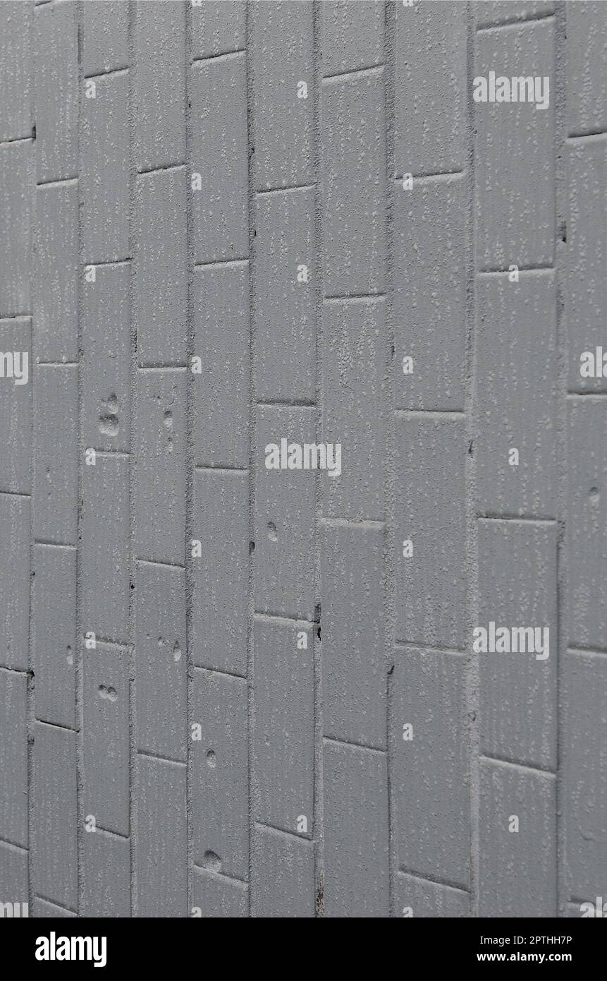 The texture of the wall from the old tile, painted gray under the ...