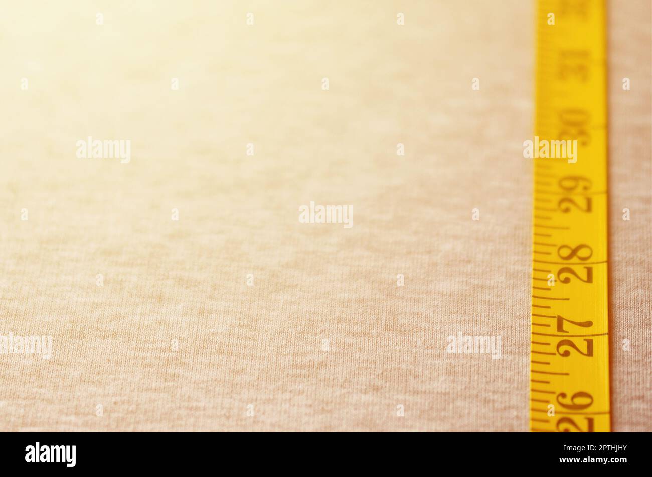 The measuring tape of yellow color with numerical indicators in the ...