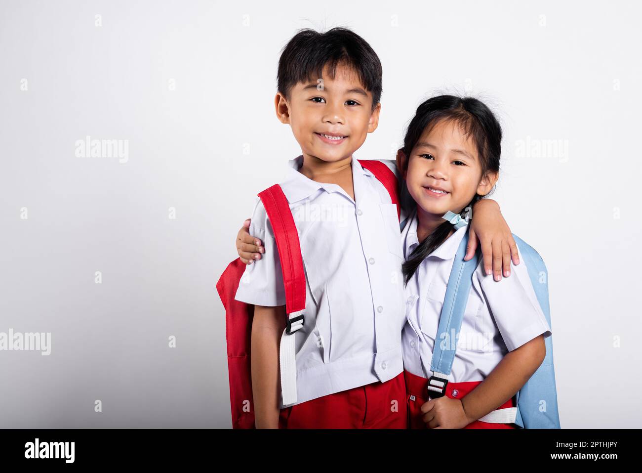 Brother and sister school uniform hi-res stock photography and images ...