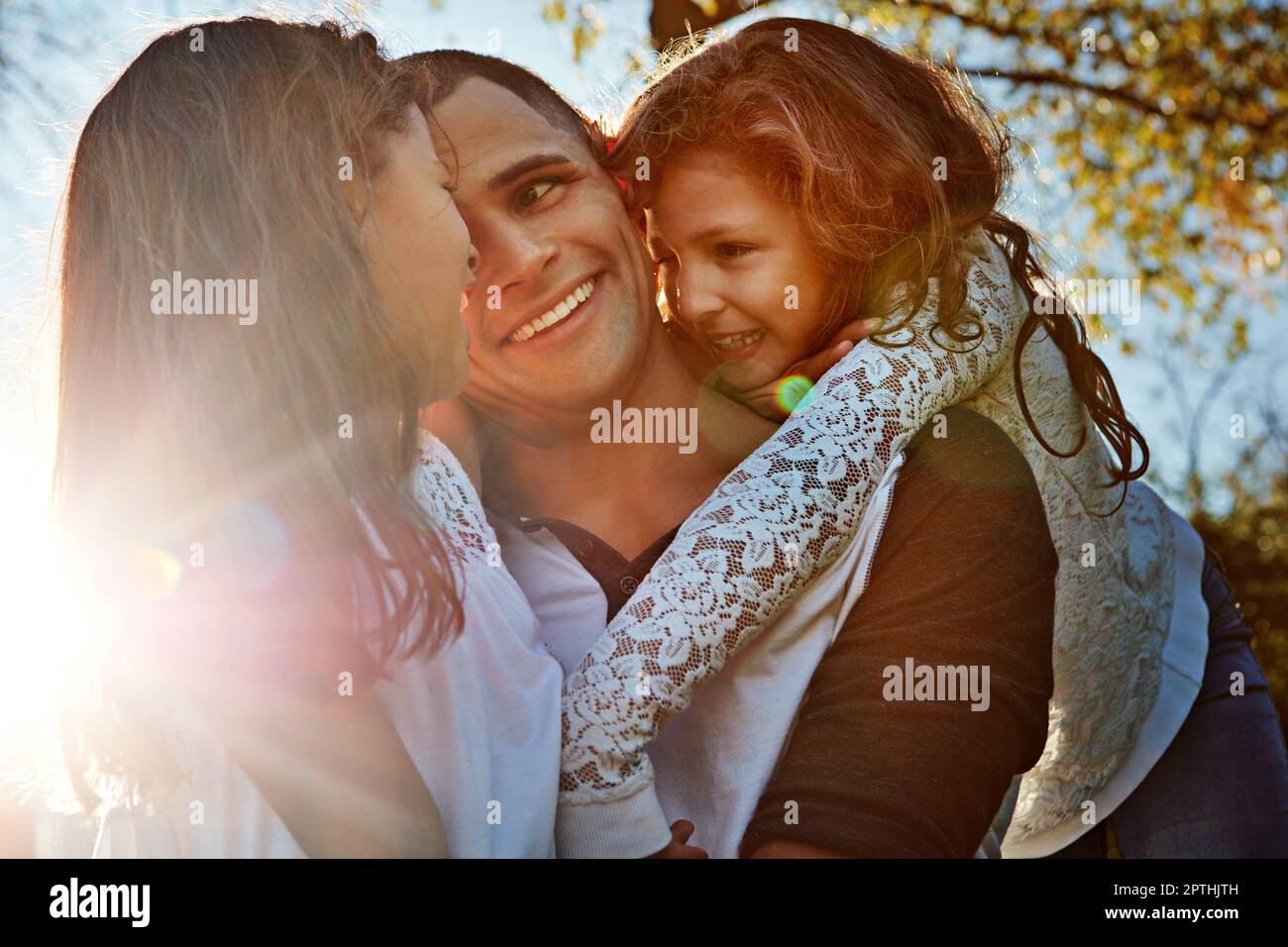Daughters are the sunshine of life. a happy young man spending time ...