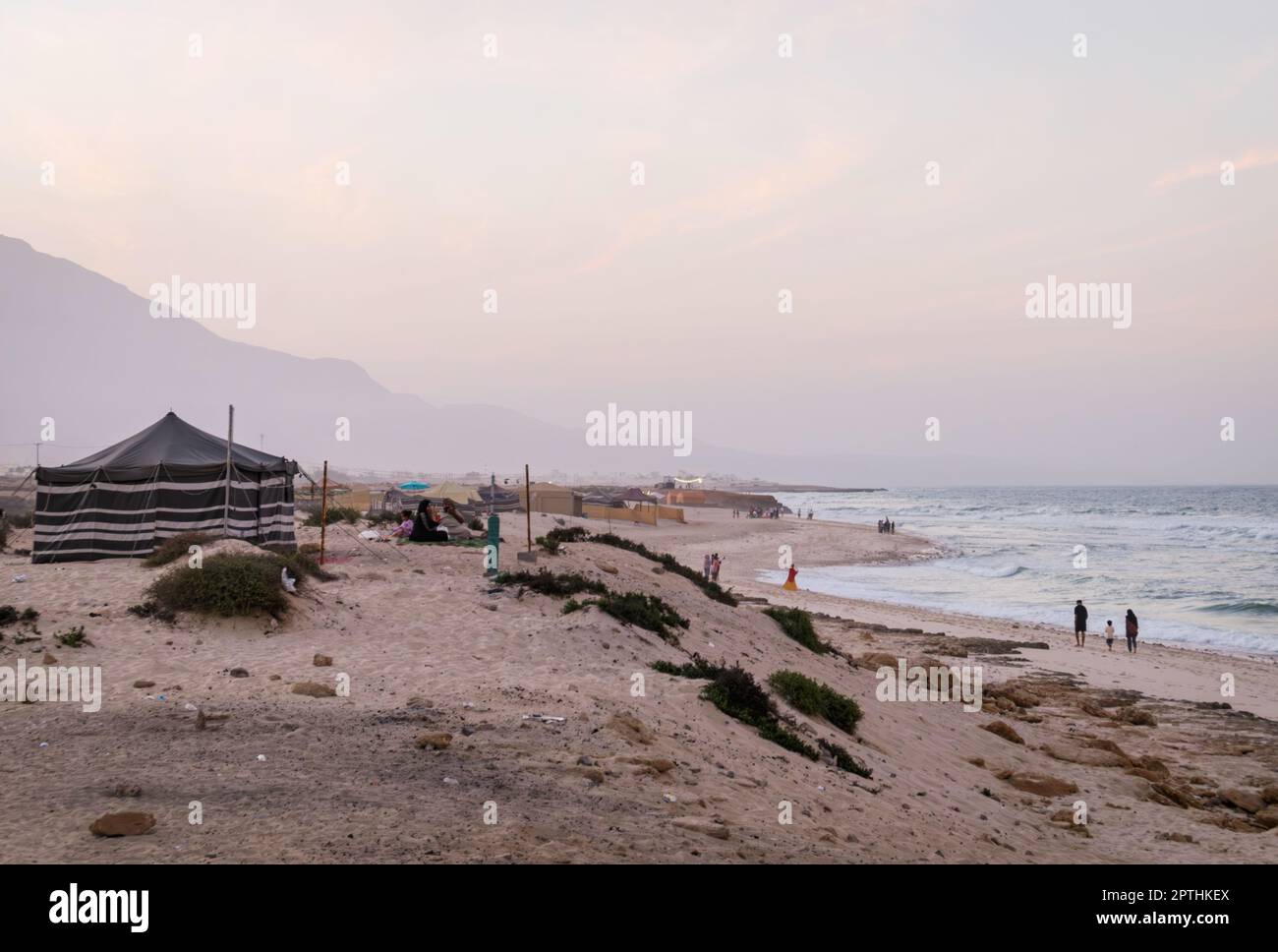 Omani people enjoy staying at White beach close to Muscat during their ...