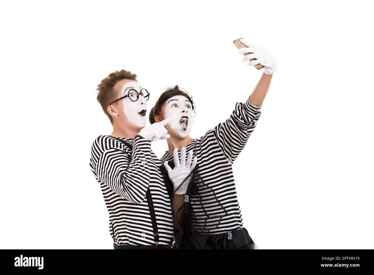 Smiling mimes in striped shirts. couple mimes making selfie on camera ...