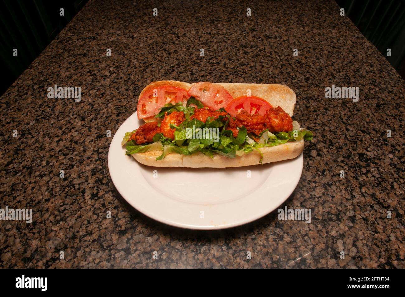 Delicious seafood sandwich known as a shrimp po boy Stock Photo - Alamy