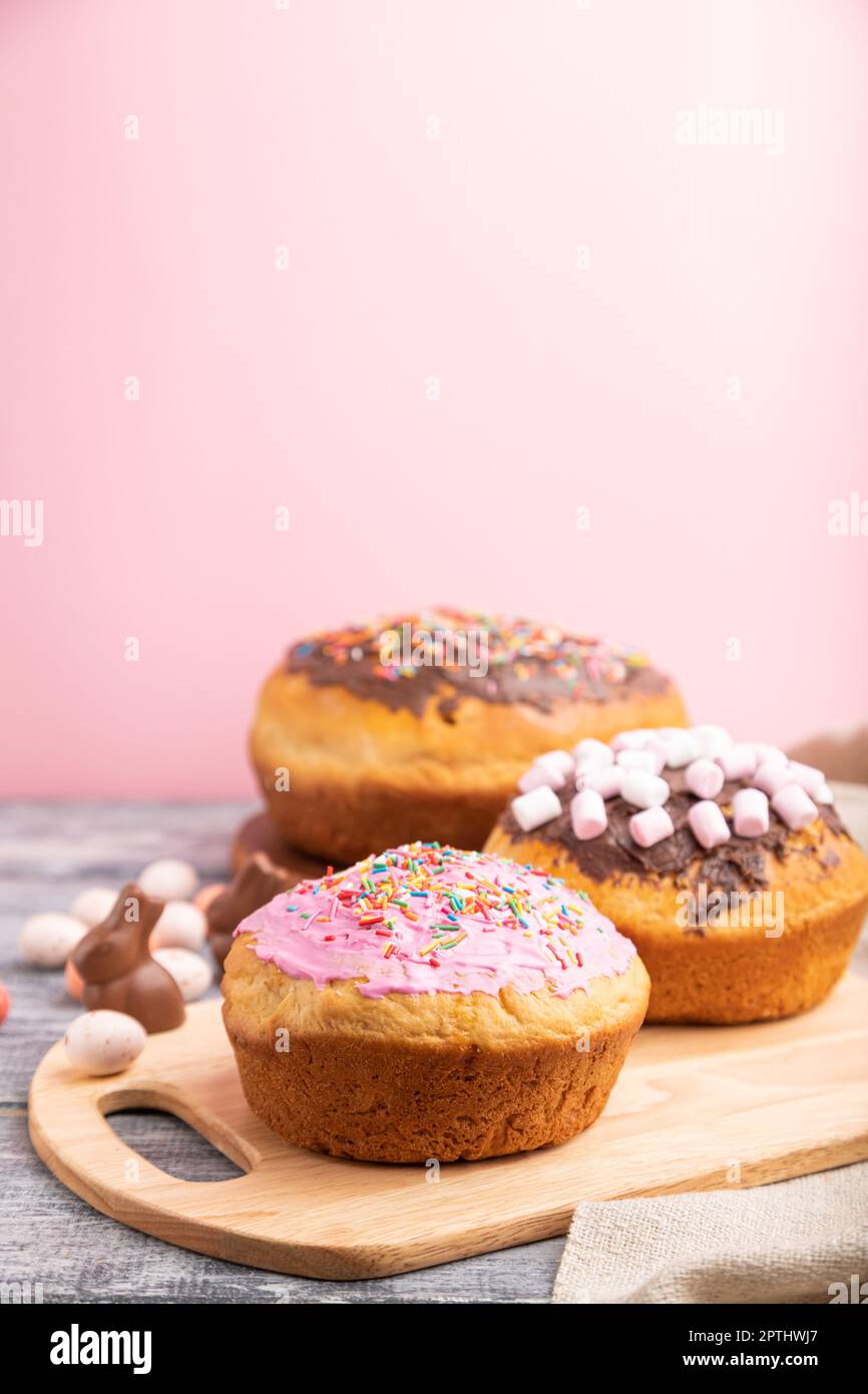 Homemade glazed and decorated easter pies with chocolate eggs and ...