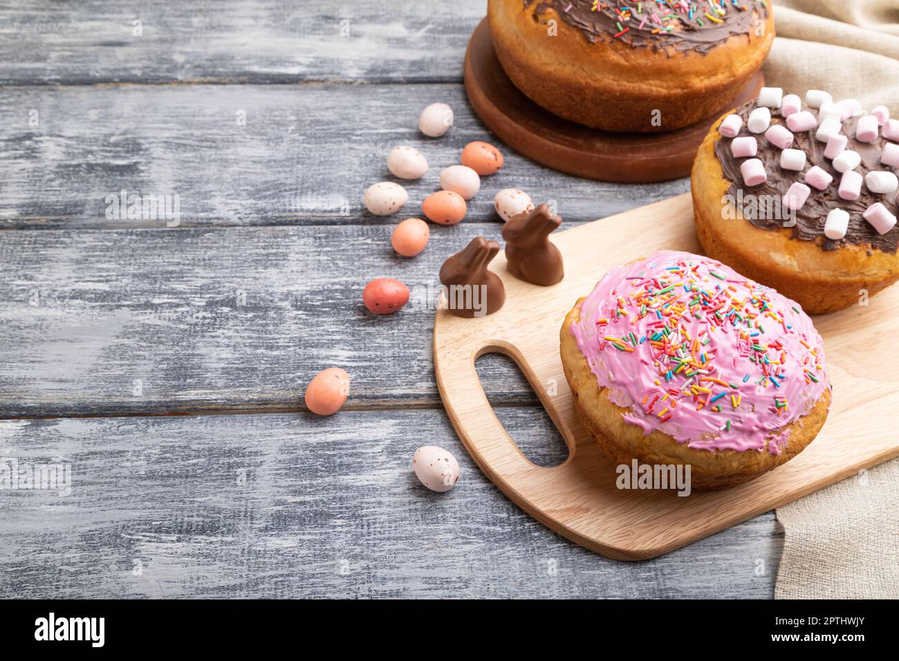 Homemade glazed and decorated easter pies with chocolate eggs and ...