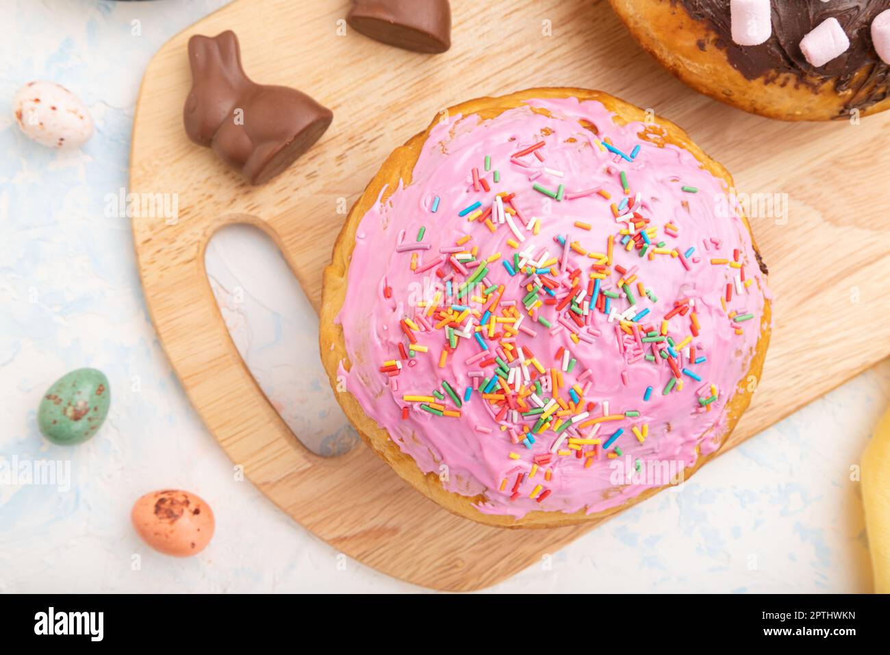 Homemade glazed and decorated easter pies with chocolate eggs and ...