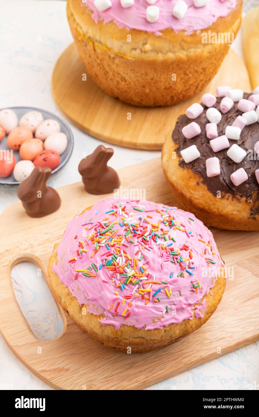 Homemade glazed and decorated easter pies with chocolate eggs and ...