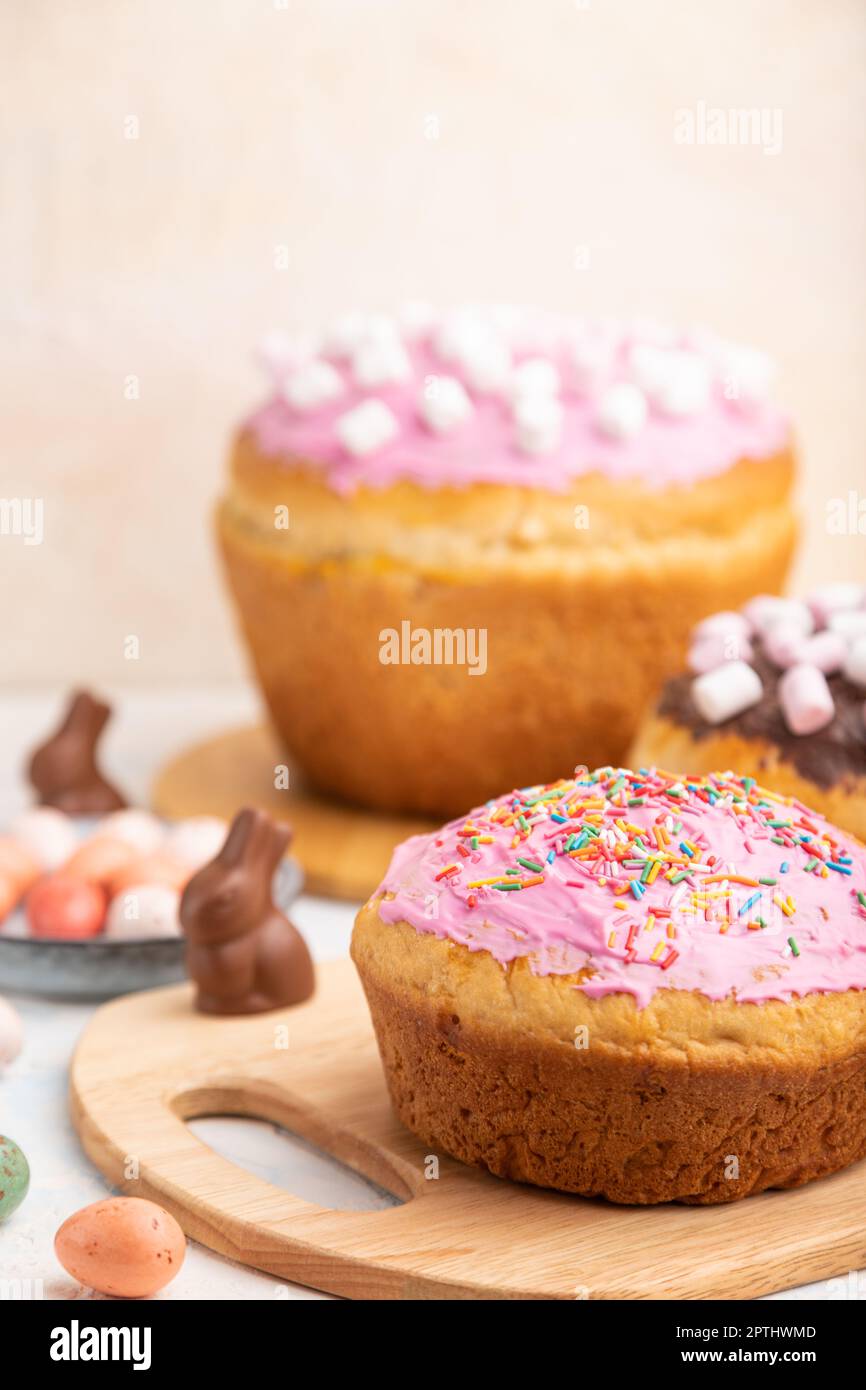 Homemade glazed and decorated easter pies with chocolate eggs and ...
