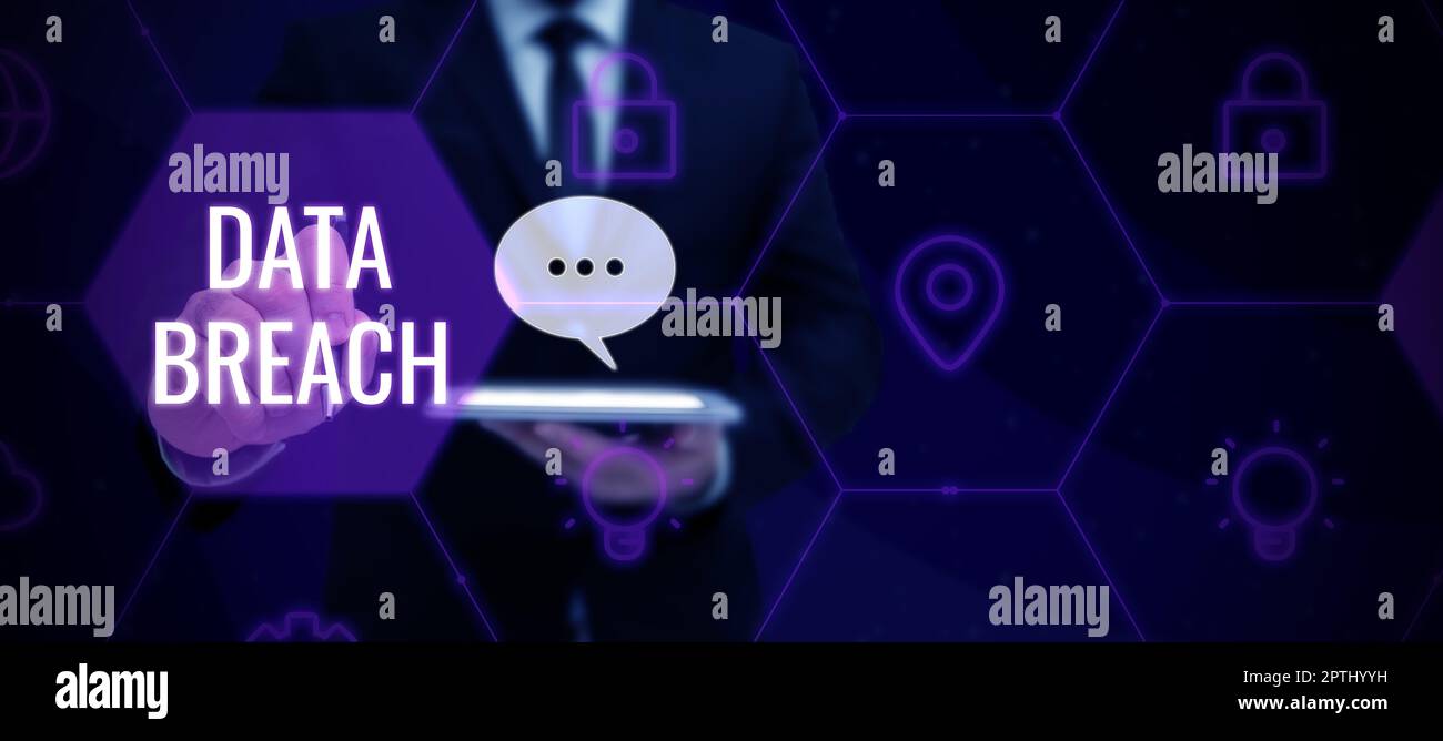 Hand writing sign Data Breach, Word Written on unauthorized release of ...