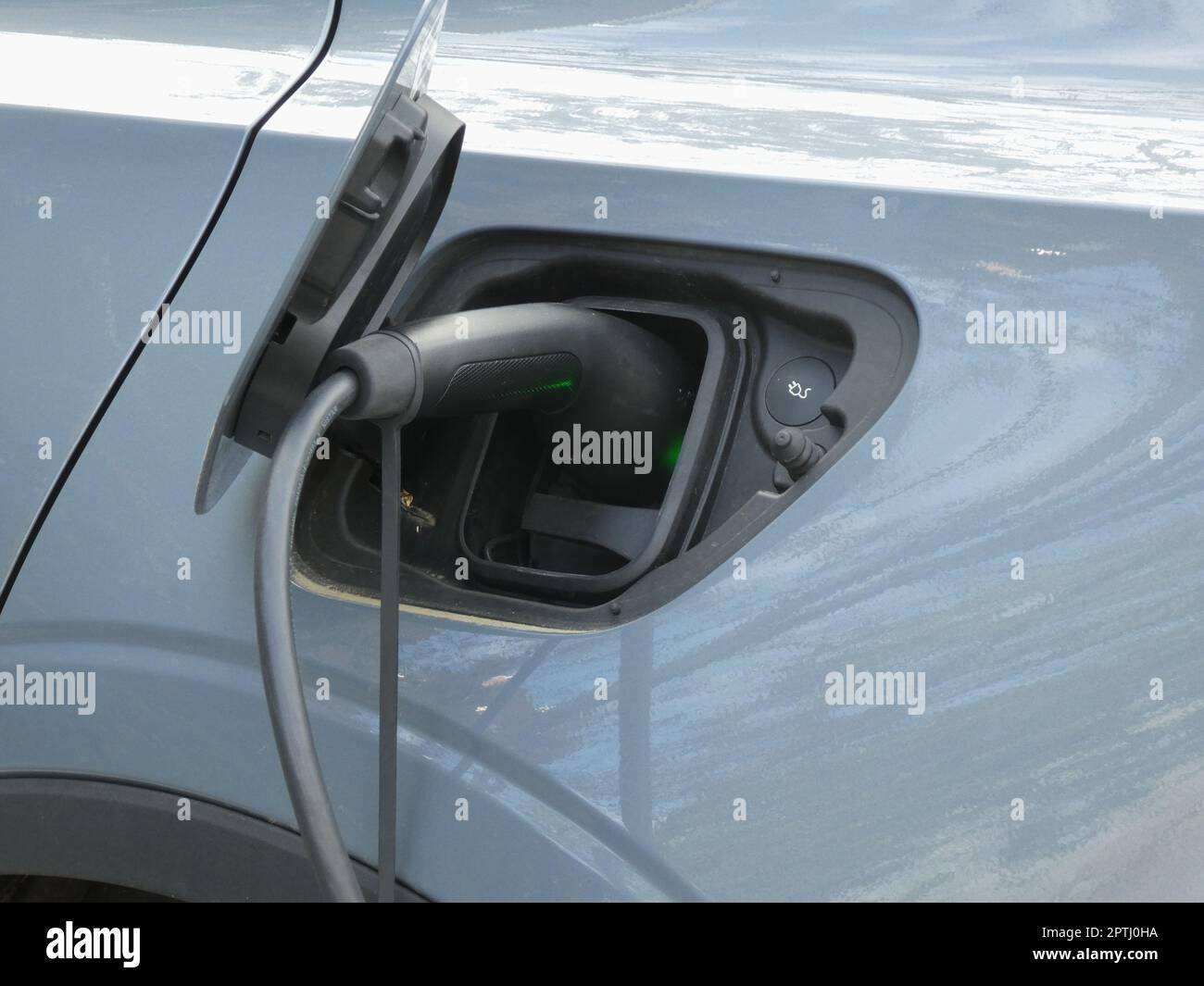 Cologne, Germany. 23rd Apr, 2023. Charging cable in charging plug ...