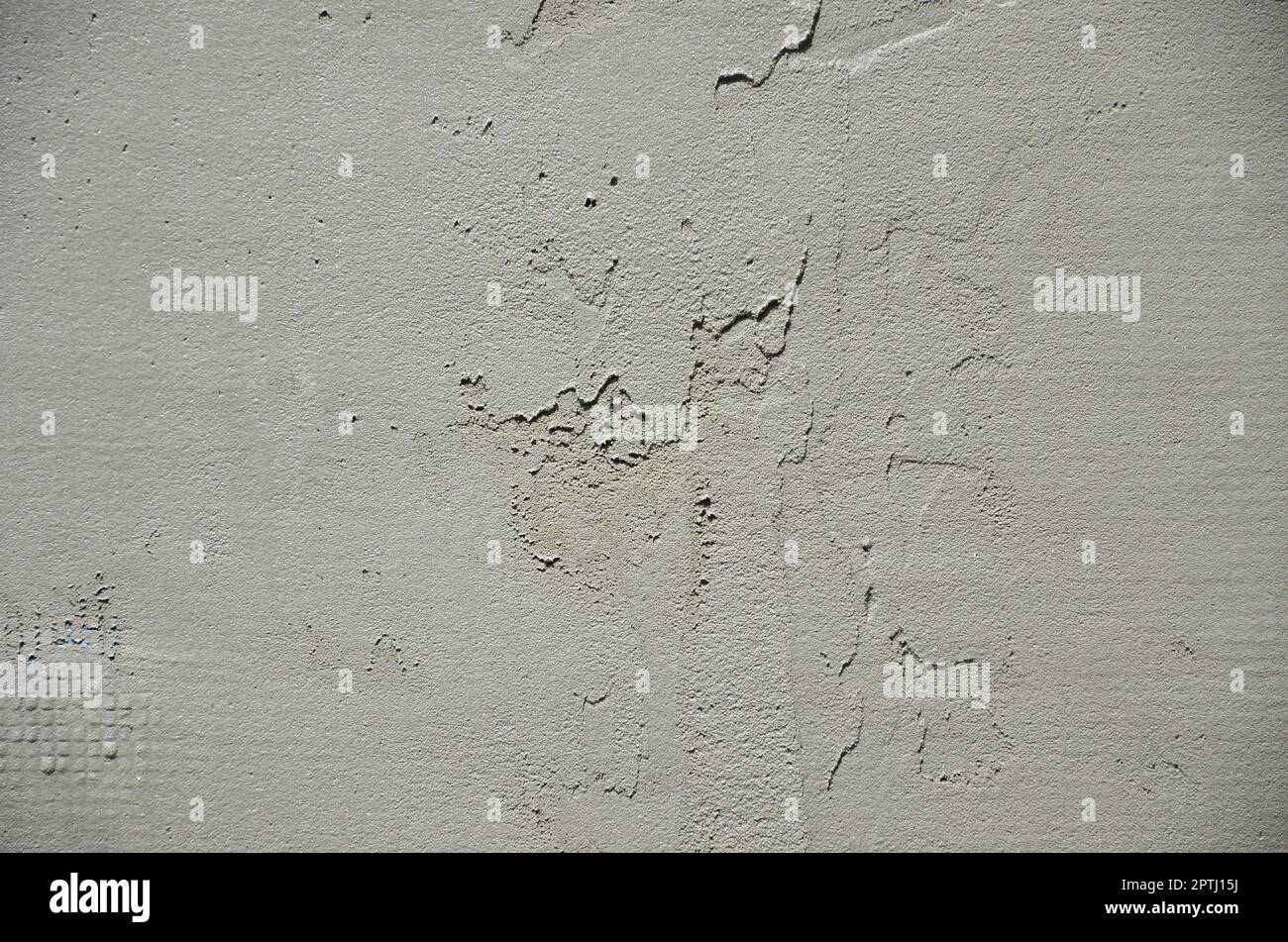 The texture of the wall, covered with gray foam polystyrene plates ...