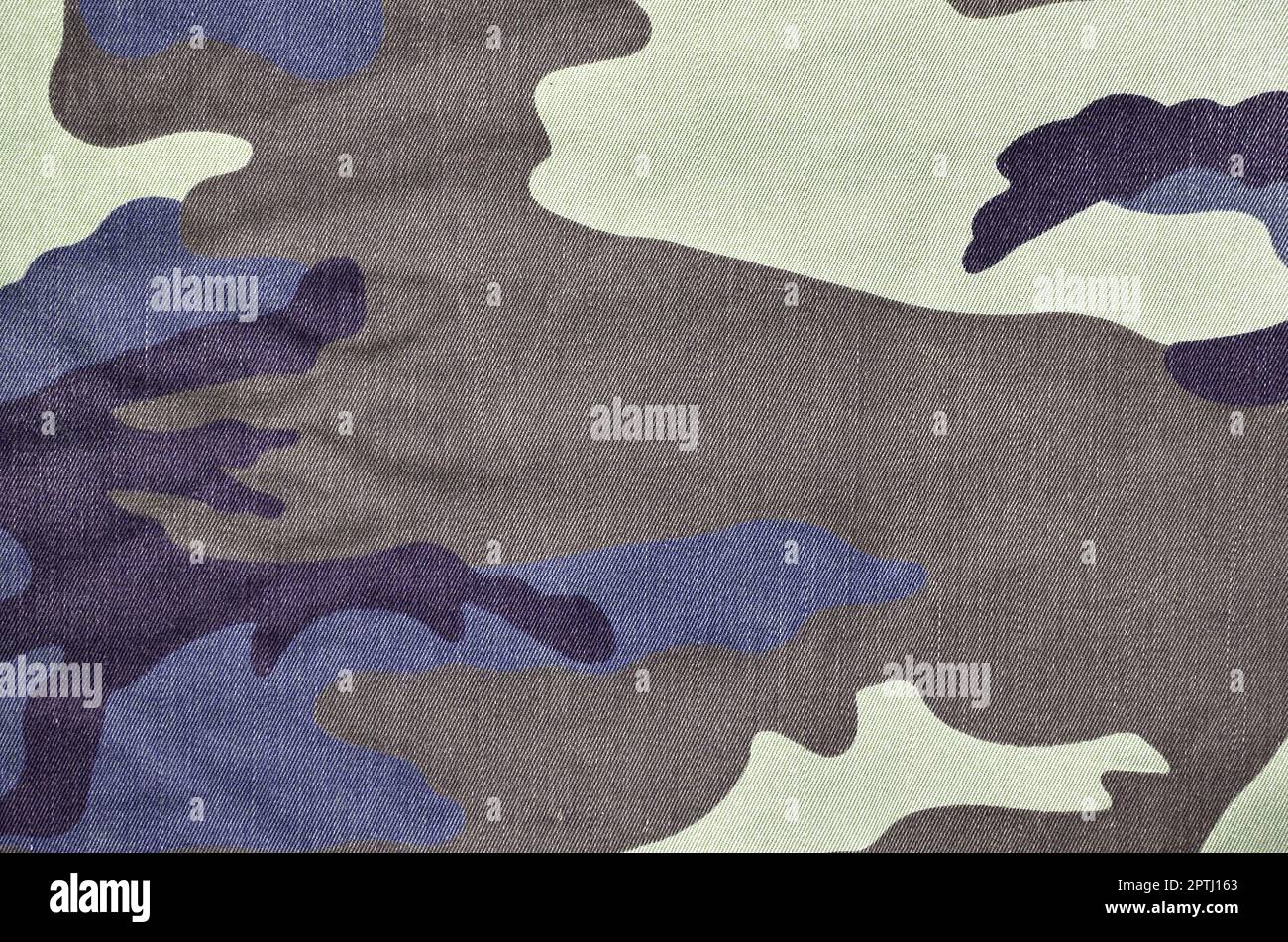 Texture of fabric with a camouflage painted in colors of the marsh ...