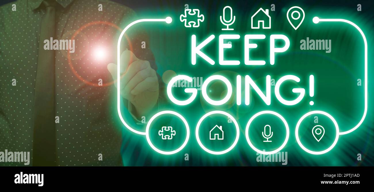 Conceptual caption Keep Going, Word Written on to continue living ...