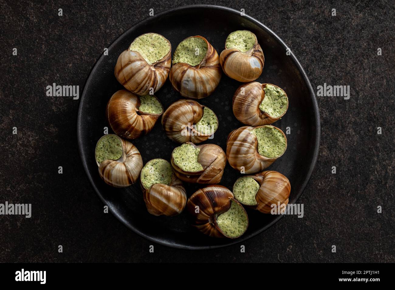 Snails with parsley butter, Bourgogne Escargot Snails on the plate ...