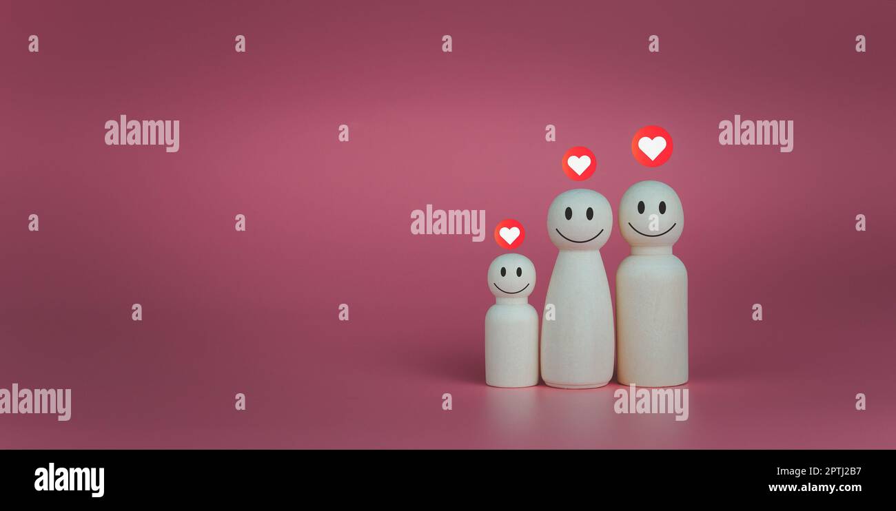 Happy house concept. Wooden dolls stand lined up with heart icons ...