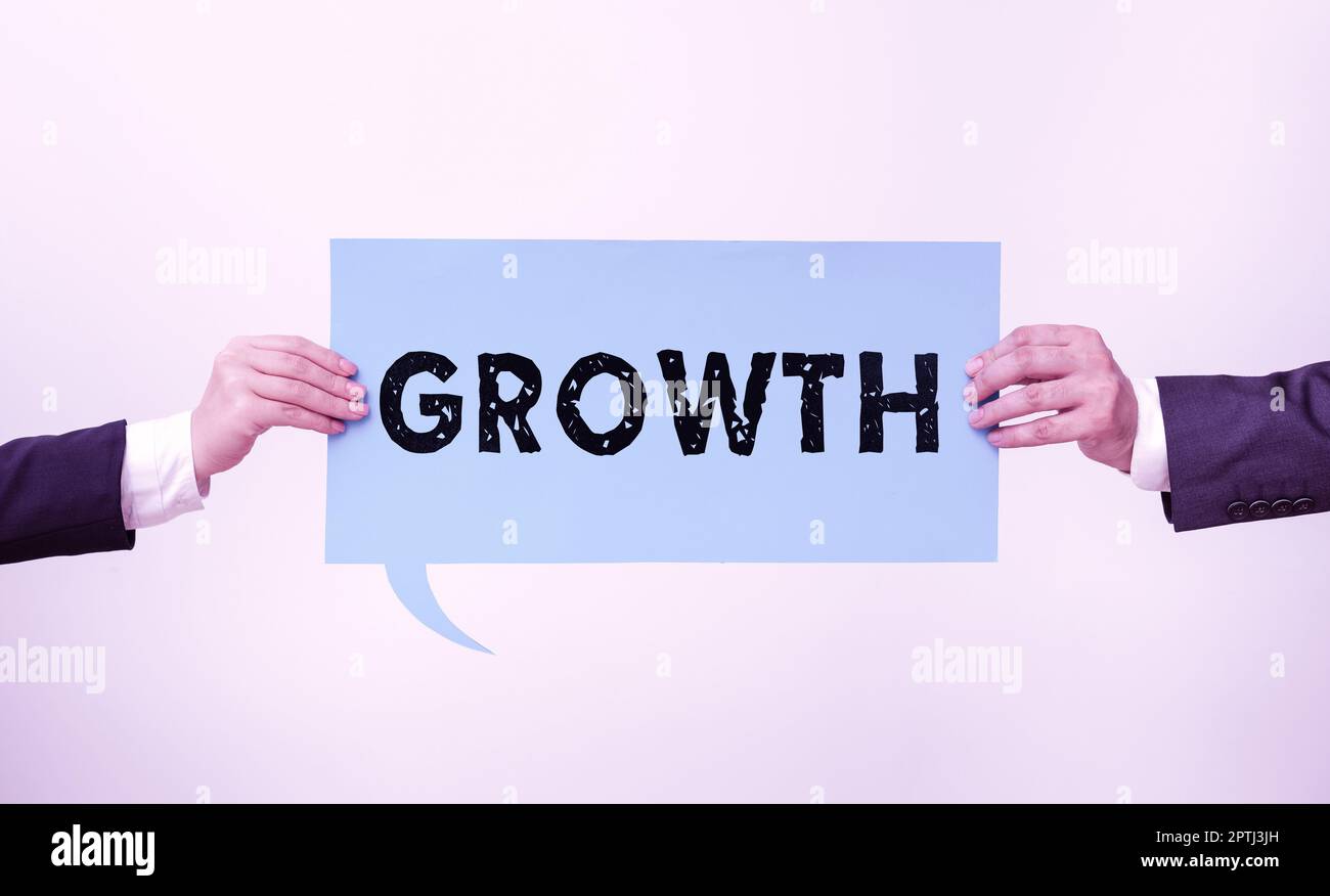 Hand writing sign Growth, Business concept progressive acquisition of ...