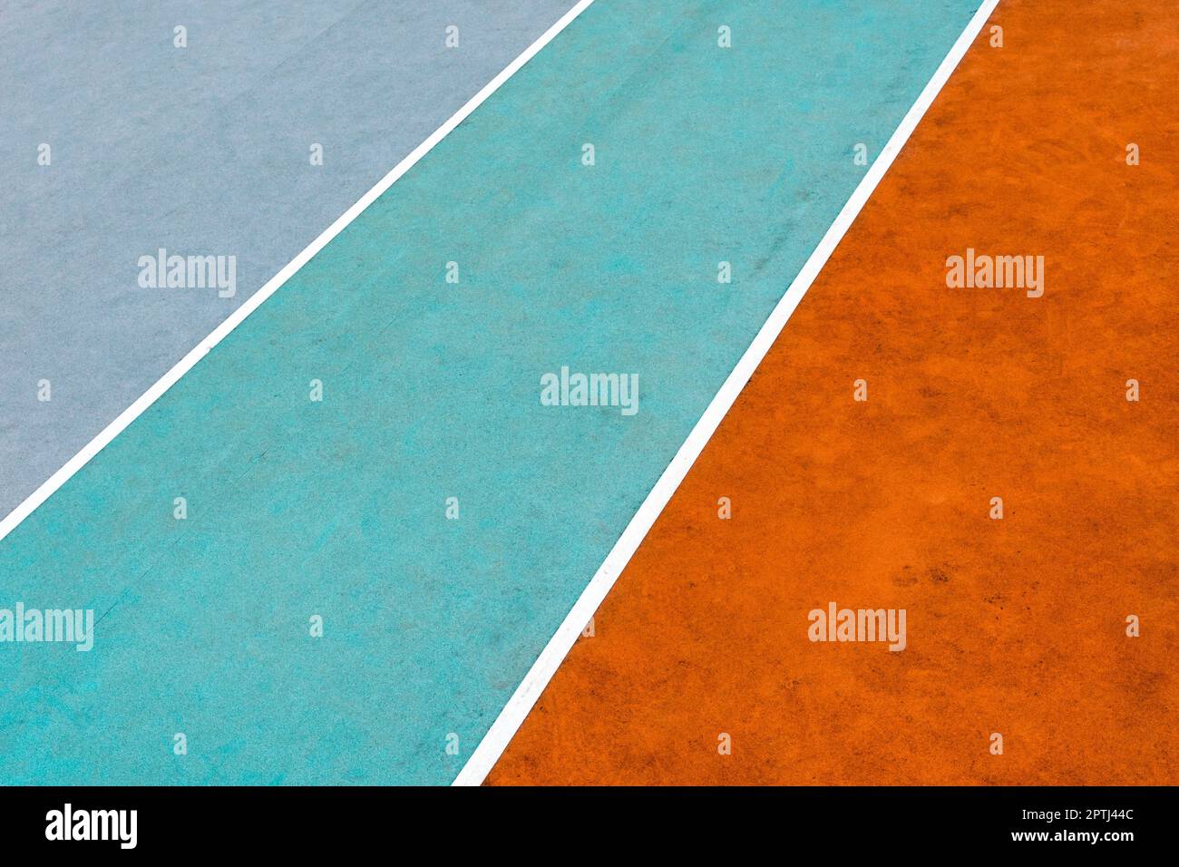 Colored rubberized surface on the sports playground. Colorful running track Stock Photo - Alamy