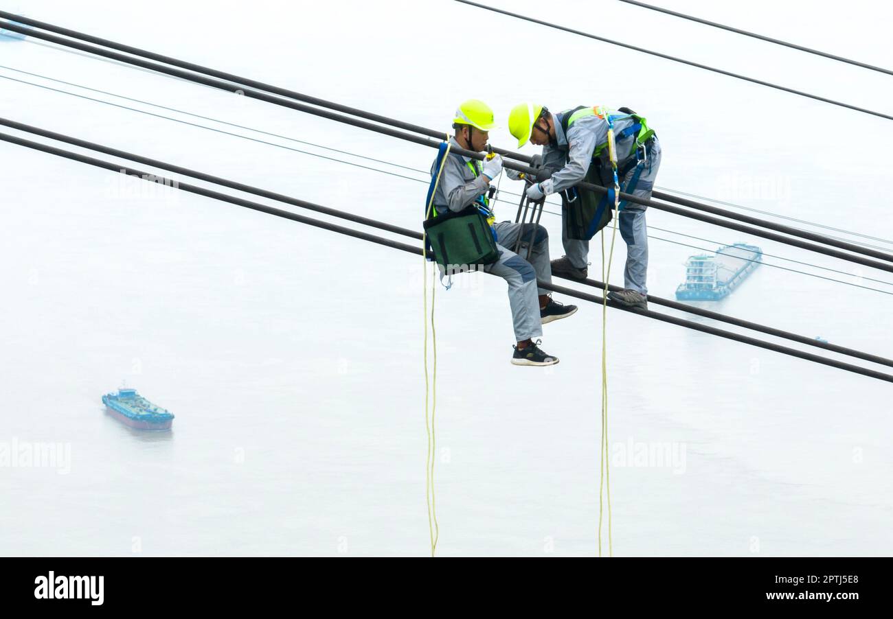 CHIZHOU, CHINA - APRIL 28, 2023 - Maintenance workers carry out ...