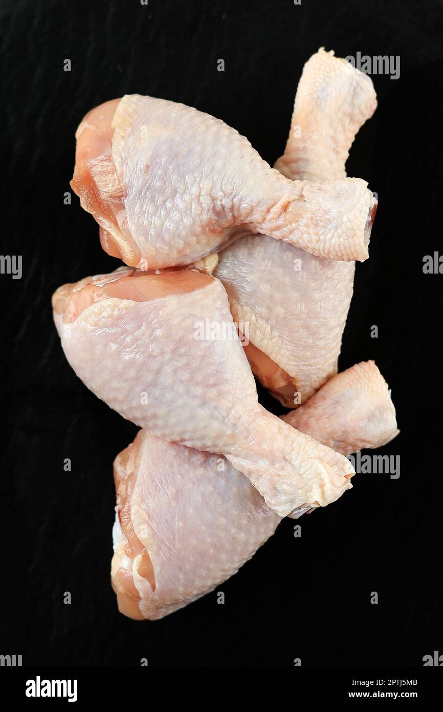 Top View Raw Chicken Leg on Black Plate, Cooking Ingredient Stock Photo ...