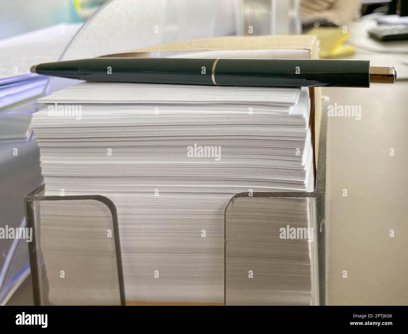 Small square pieces of paper for notes and notes on the office desk and ...