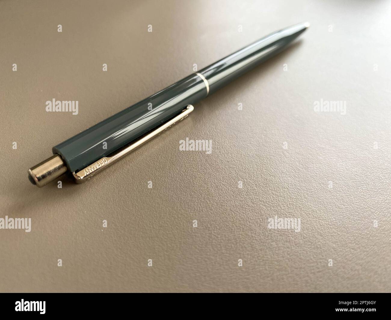 Automatic green ballpoint pen for writing on your desktop office desk ...