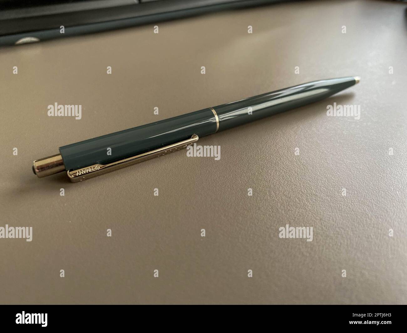 Automatic green ballpoint pen for writing on your desktop office desk ...