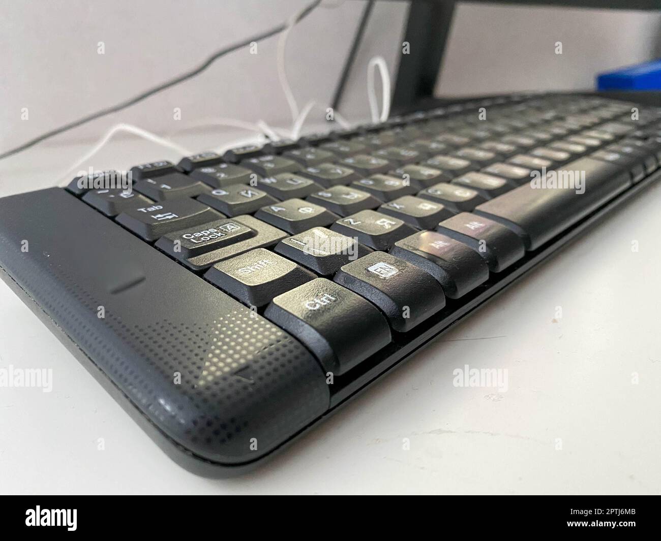 Closeup of a modern silver computer keyboard keys. Close up view of a ...