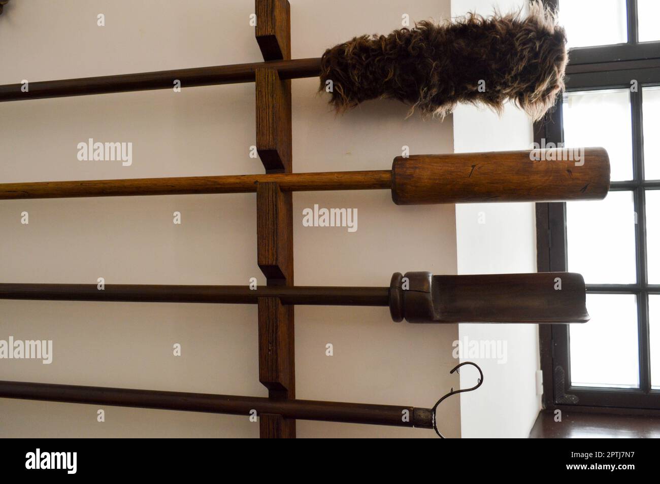 Large long wooden sticks, shampols with fluffy brushes for cleaning old ...