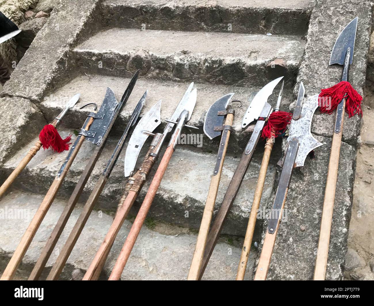 The old ancient medieval cold weapons, axes, halberds, knives, swords ...