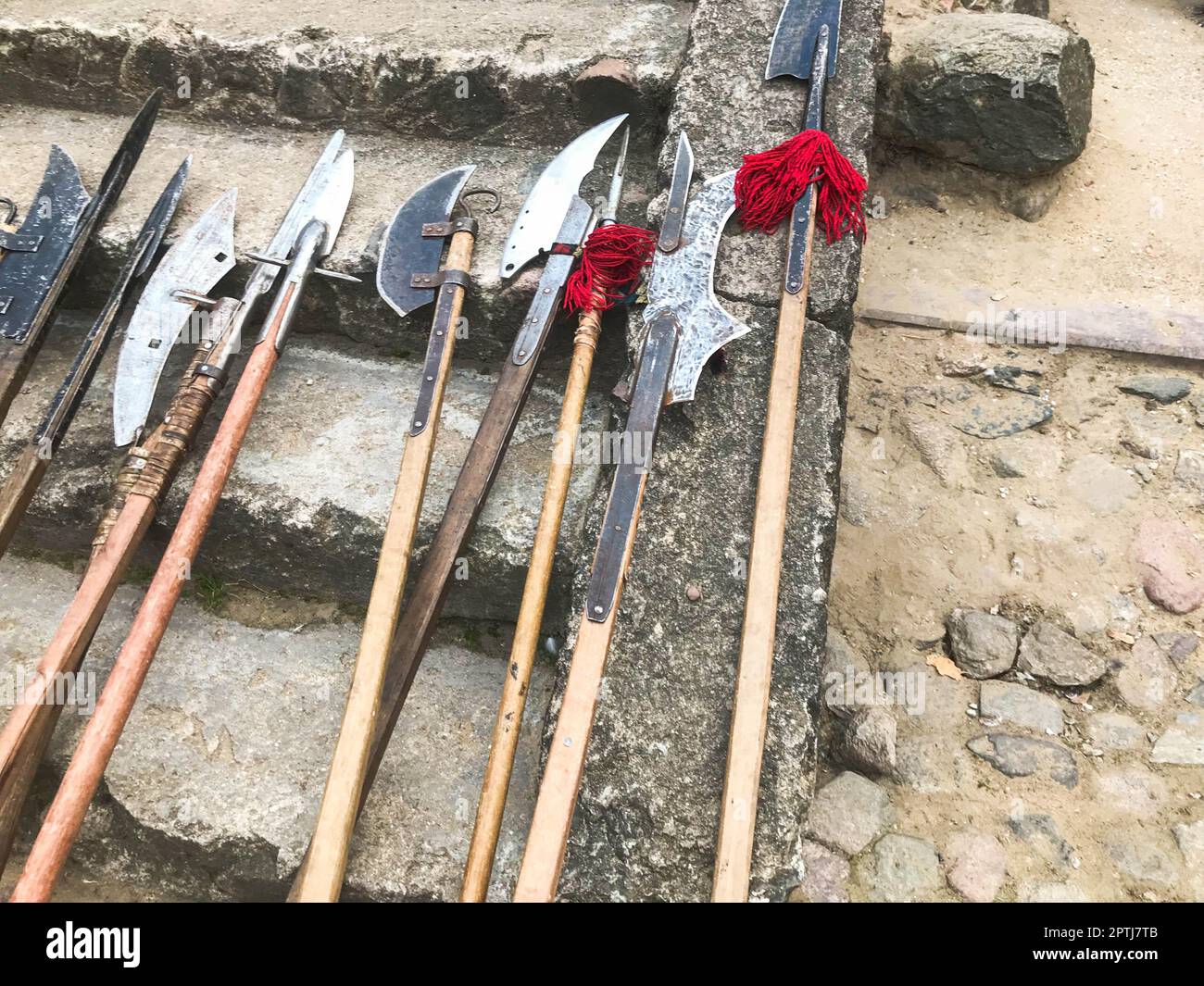 The old ancient medieval cold weapons, axes, halberds, knives, swords ...