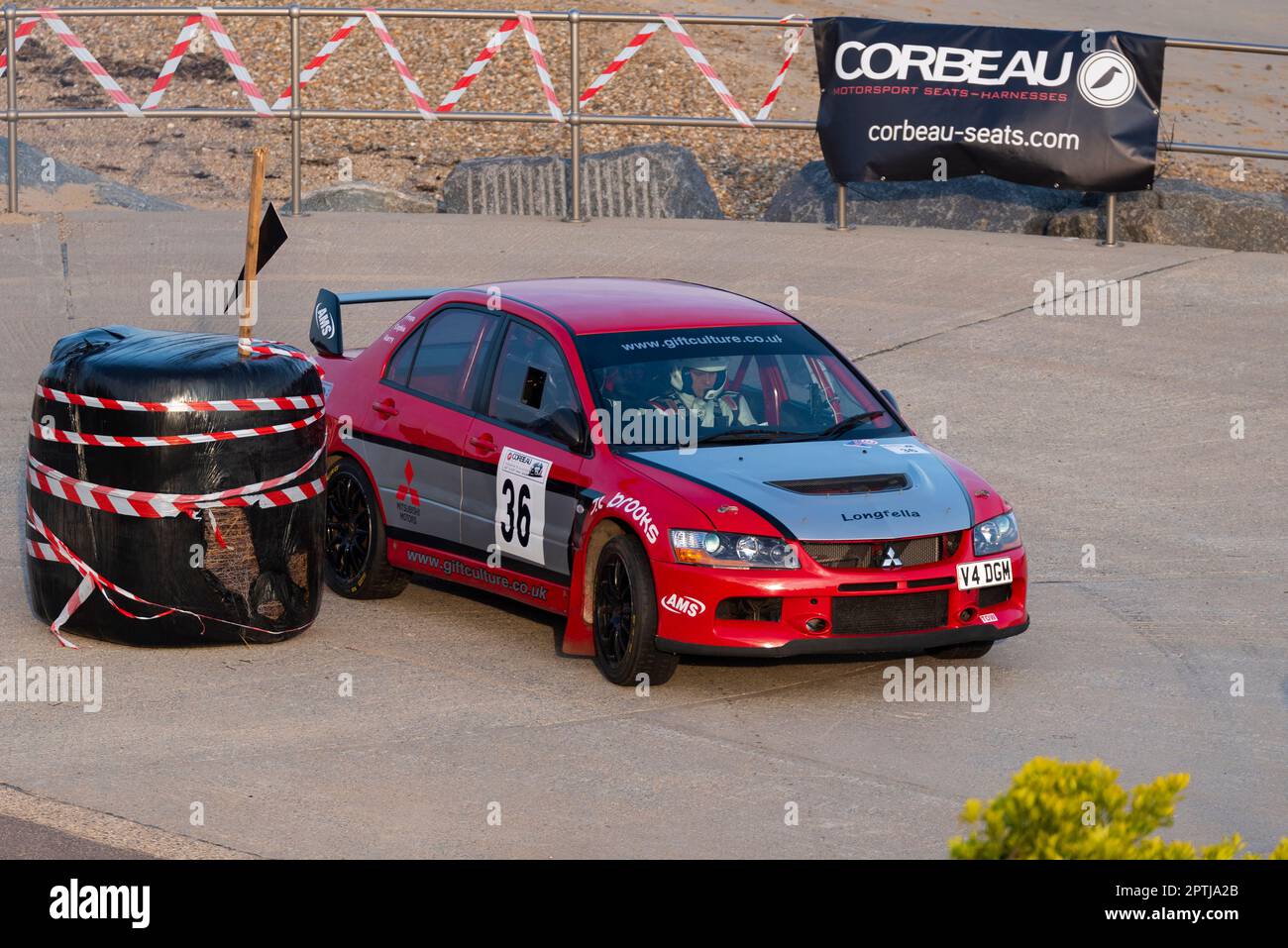David Longfellow racing a Mitsubishi Lancer Evolution 9 competing in ...