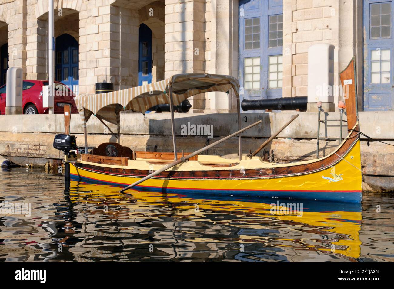 Colourful traditional Maltese boat luzzu in the Grand Harbour Marina ...