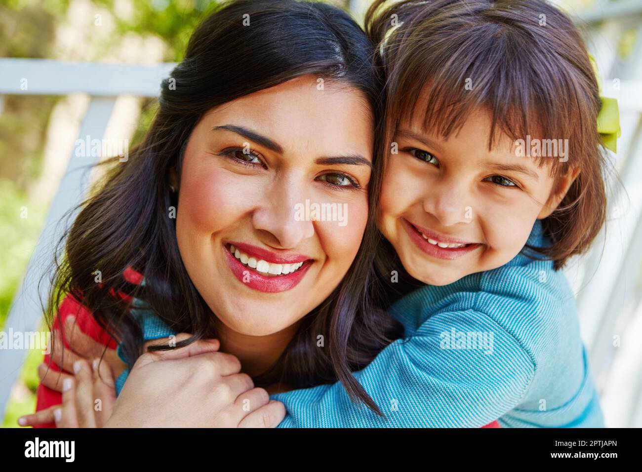 Can you spot the resemblance. a mother receiving a hug from her ...