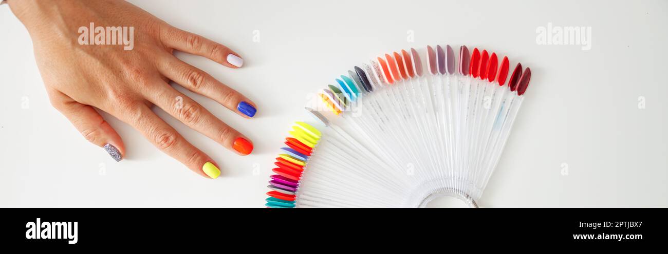 Elegant woman getting manicure service in beauty salon Stock Photo - Alamy