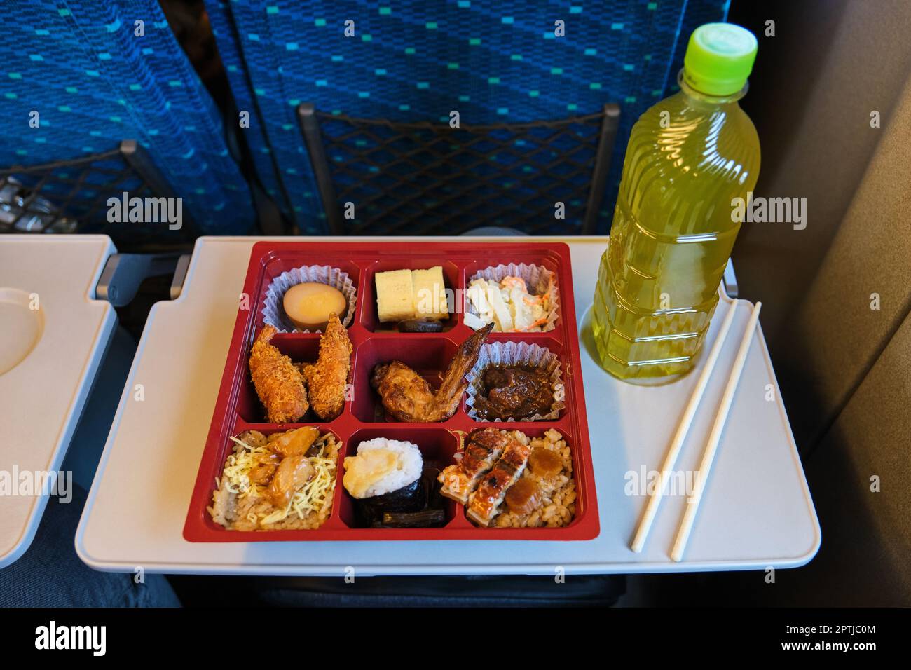 Japanese Eki Bento and a bottle of green tea on a Shinkansen Train in ...