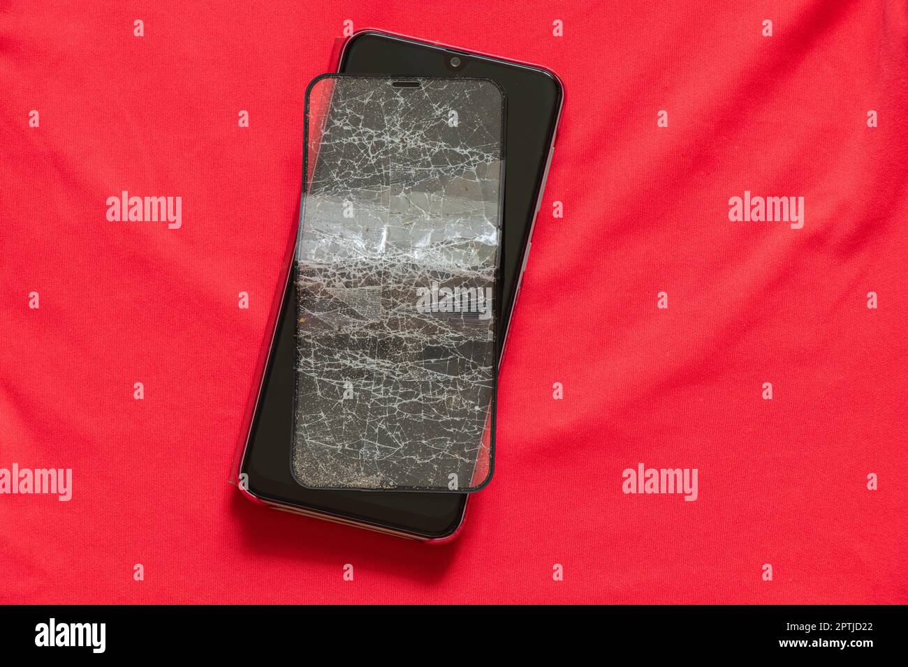 mobile phone and broken tempered glass on an isolated background, glass ...