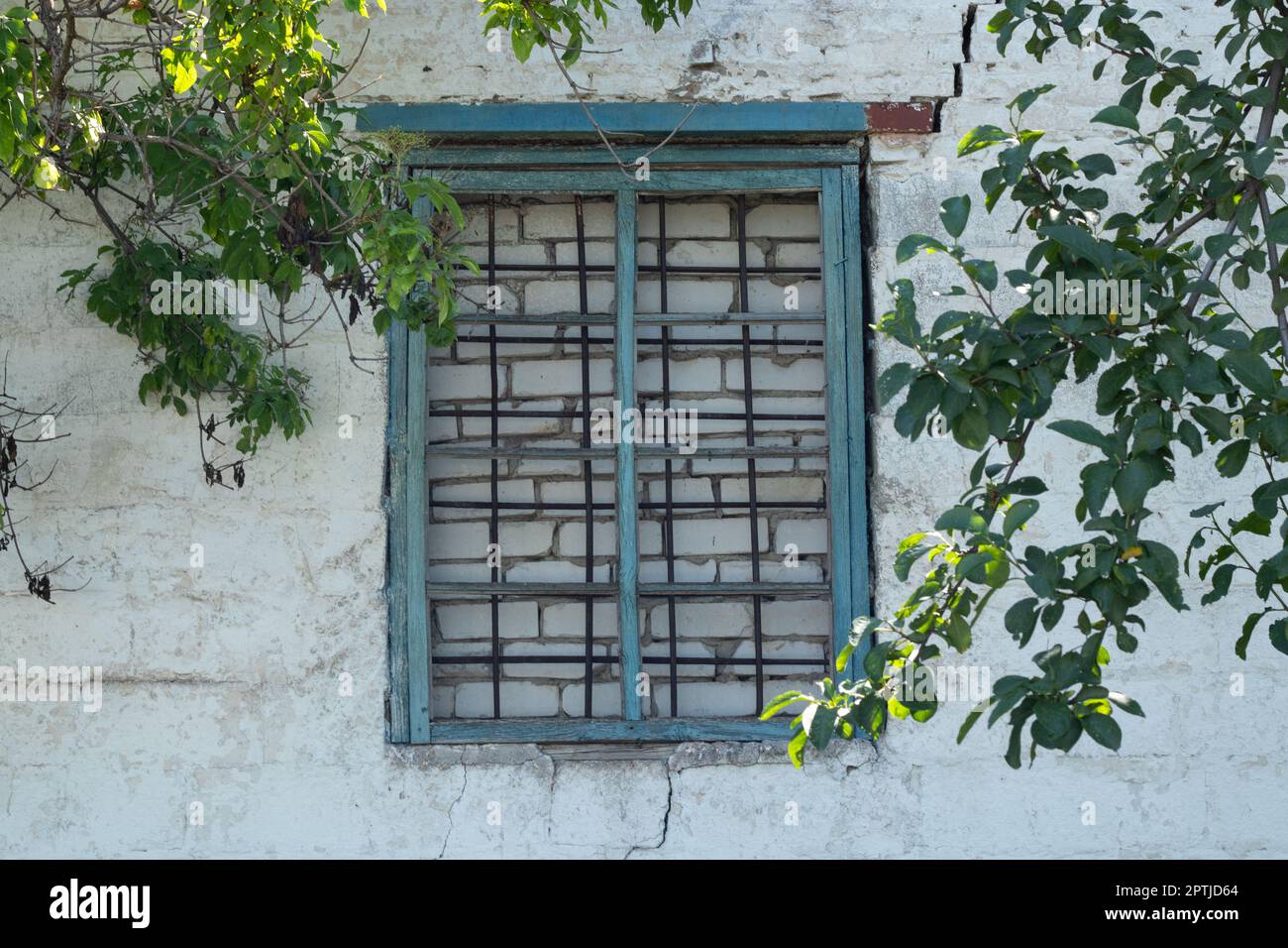 bricked window and grate in an abandoned house Stock Photo - Alamy