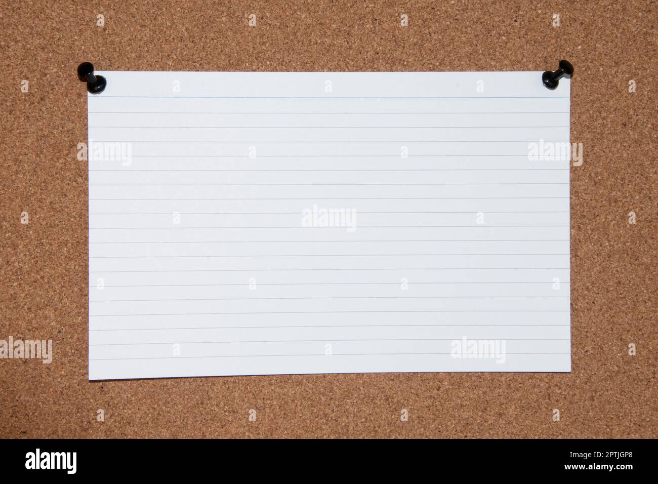 Cork board with tacks, white flash card Stock Photo - Alamy