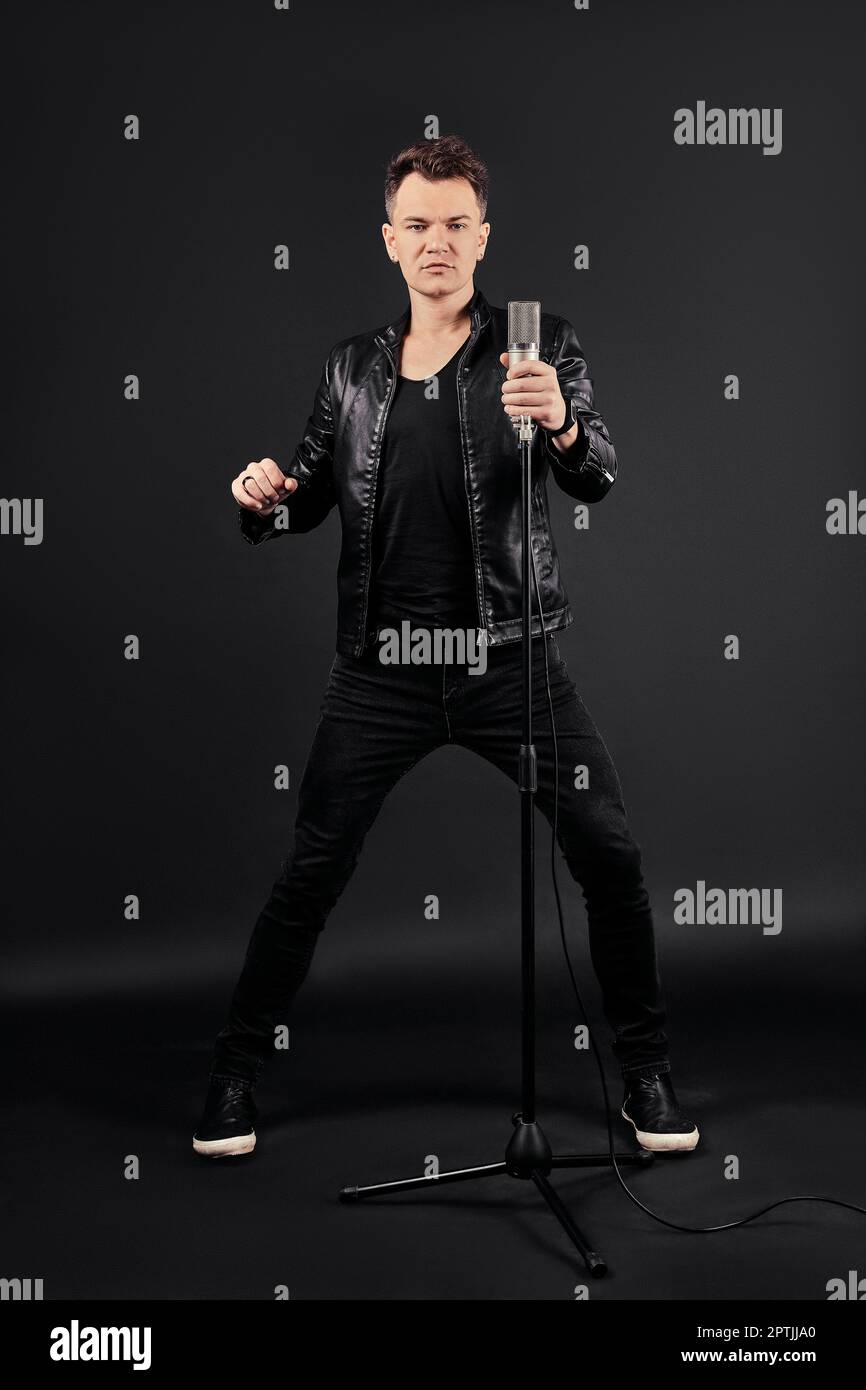 Full length portrait of singing artist Stock Photo - Alamy