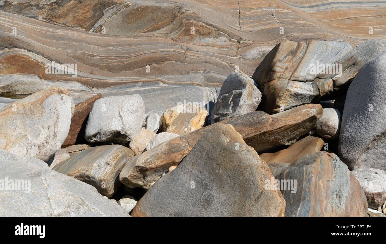 Riverbank rocks in the Alps Stock Photo - Alamy
