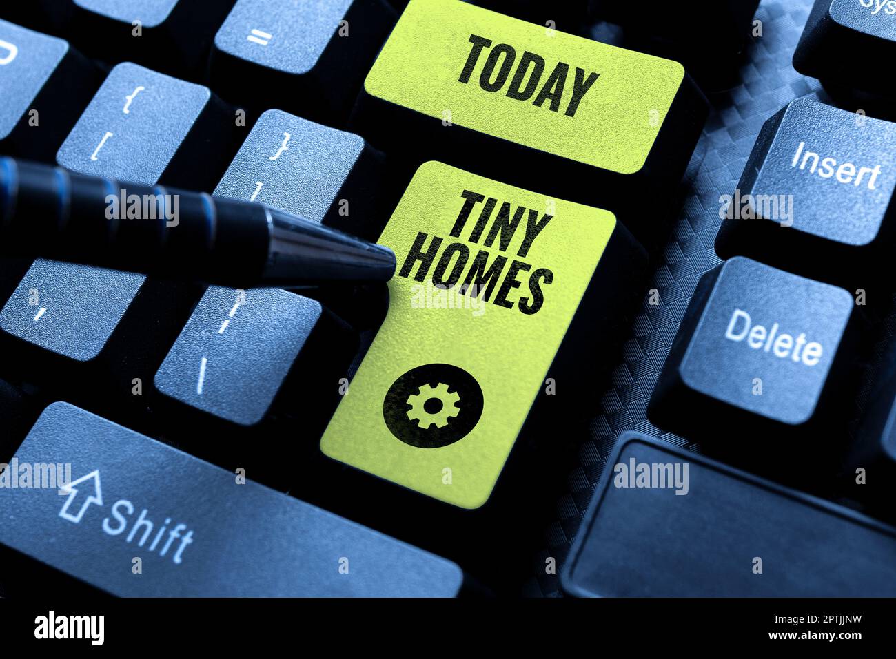 Text sign showing Tiny Homes, Business concept houses contain one room ...