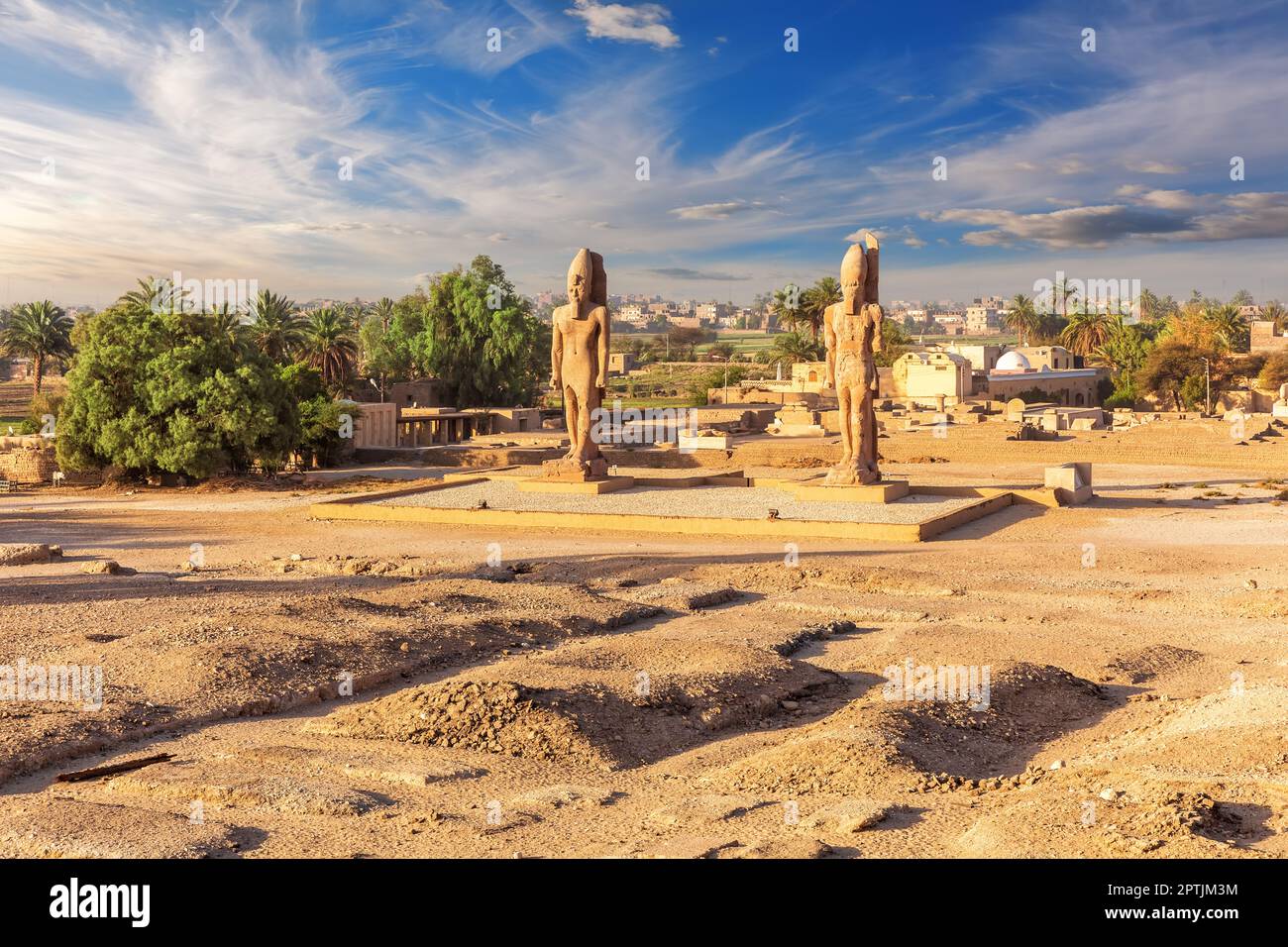The great Colossal statues near Mortuary Temple of Thutmose III, Luxor ...