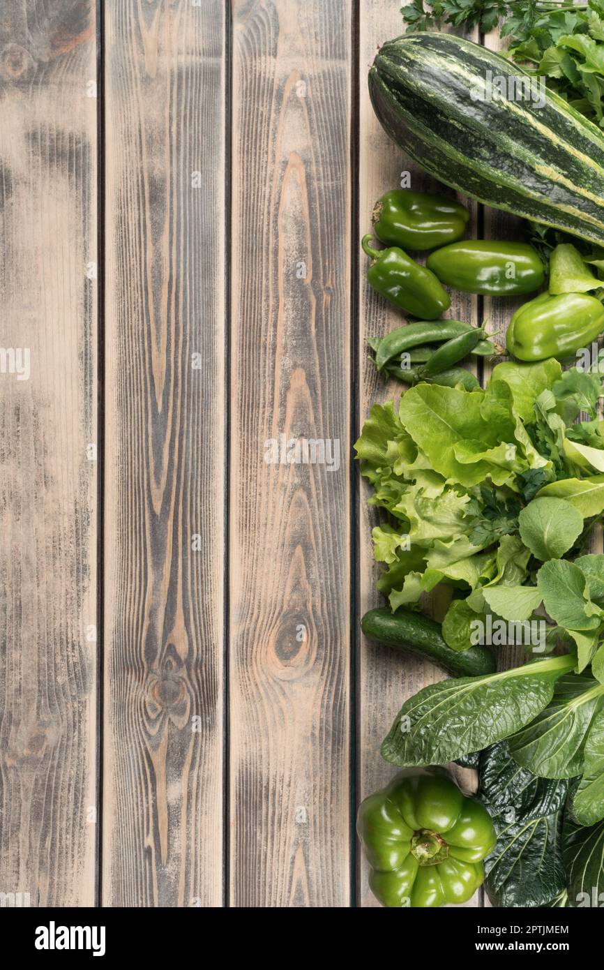 Vertical green food composition of organic, natural garden vegetables ...